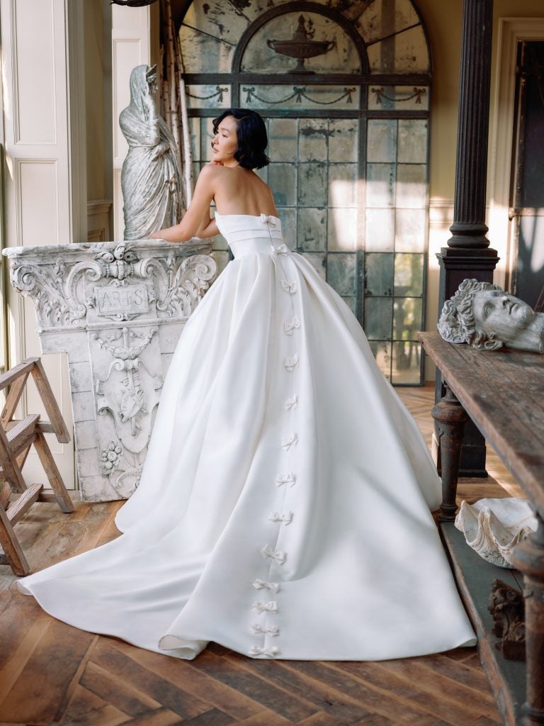Hand-Draped Basque-Waist Silk Ball Gown With Bows | Kleinfeld Bridal