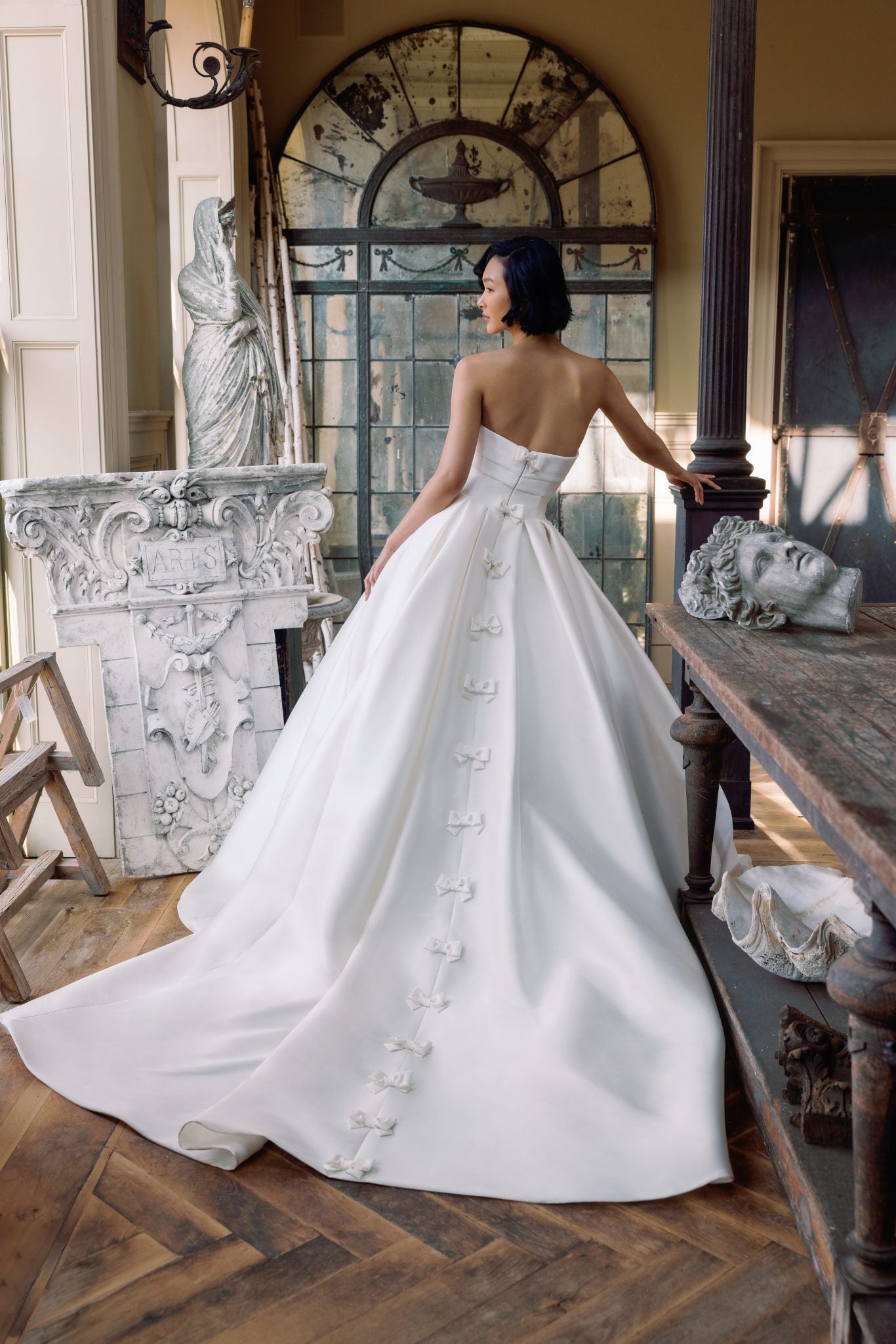 Hand-Draped Basque-Waist Silk Ball Gown With Bows | Kleinfeld Bridal